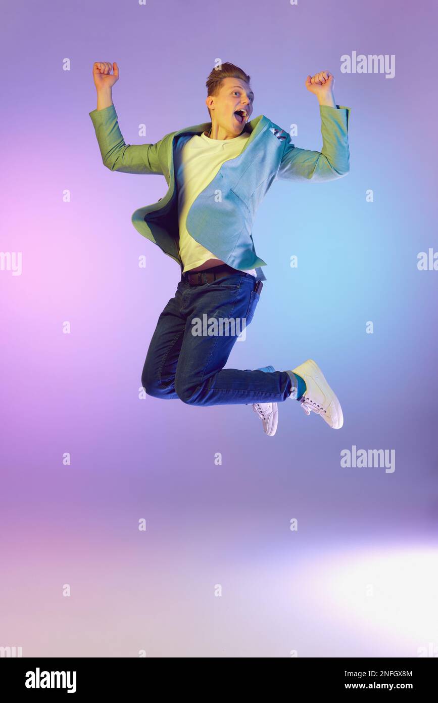 Feeling happiness. Energy burst. Young handsome man in stylish jacket ...