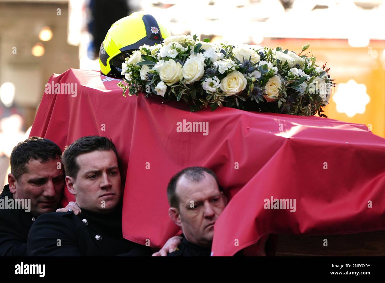 The coffin of Barry Martin is carried into St Giles' Cathedral in ...