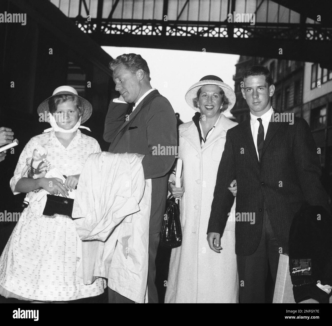 Actor Van Johnson, second to left, his wife, Eve Lynn Abbott, daughter Schuyler Johnson and son ...