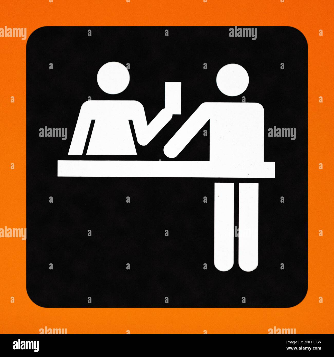 Squared photo of a black and white sign indicating that the direction ...