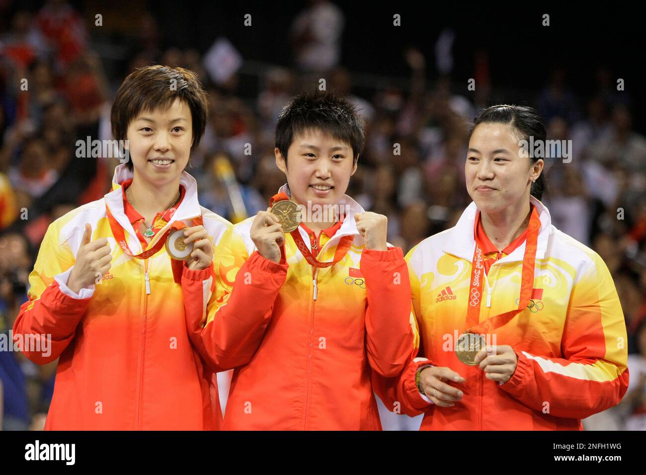 China's Zhang Yining, right, Guo Yue, center, and Wang Nan celebrate on ...