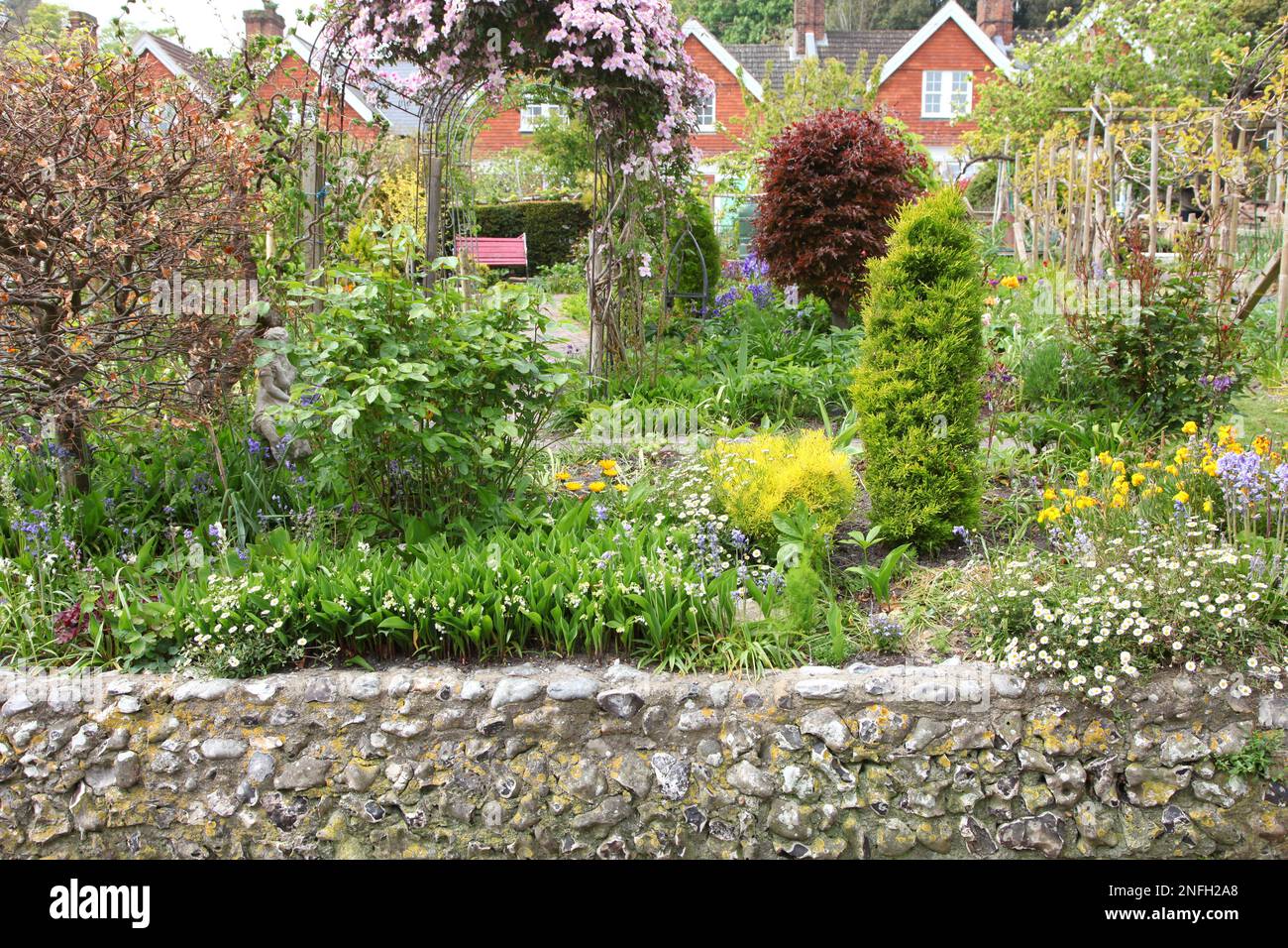 Colorful allotment plots filled with colorful spring flowers Stock ...