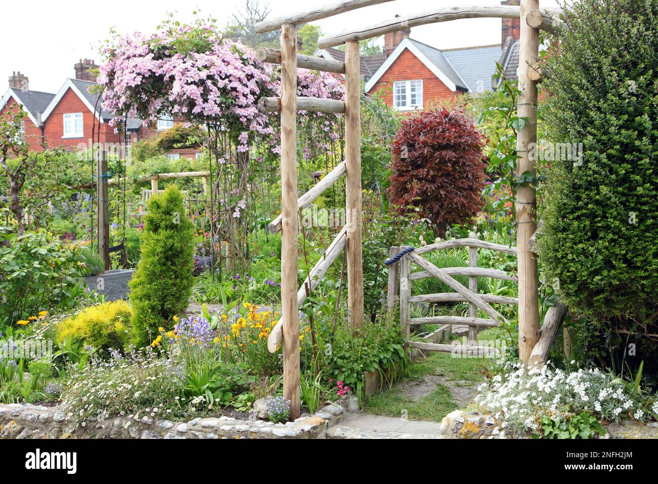 Colorful allotment plots filled with colorful spring flowers Stock ...