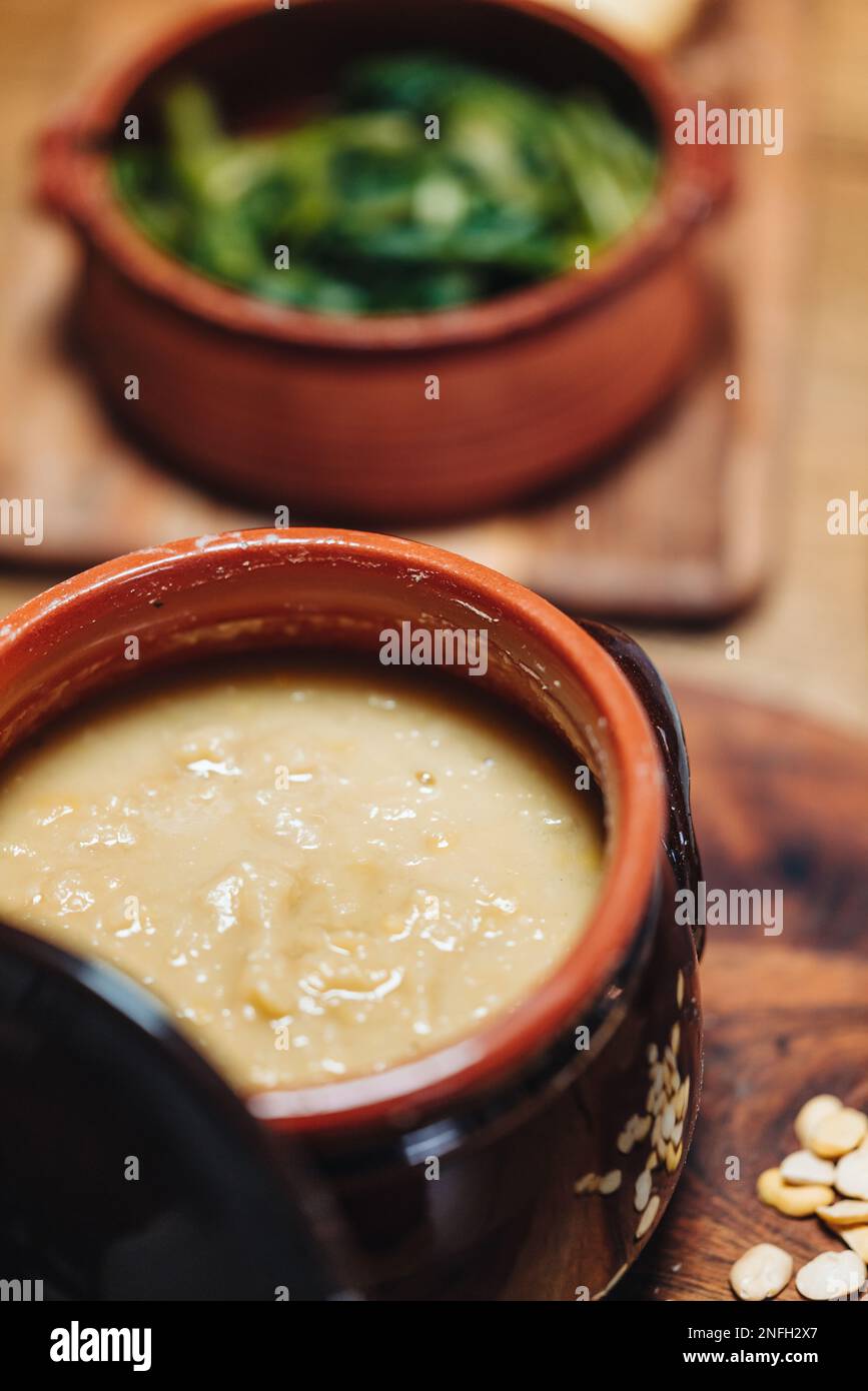 Traditional chicory and fava beans meal from Puglia, Italy Stock Photo ...
