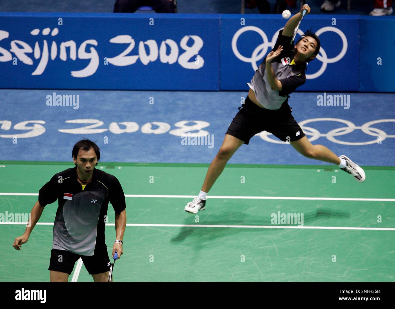 Indonesia's Flandy Limpele, left, and Vita Marissa compete for the bronze medal against China's ...