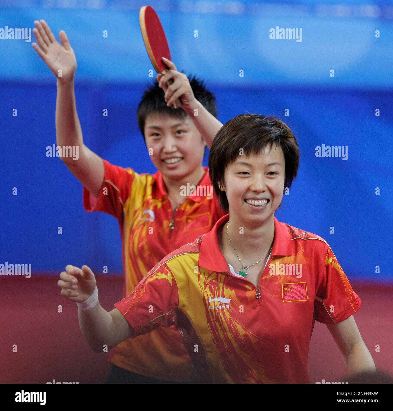China's Guo Yue, left and Zhang Yining celebrate their victory over ...