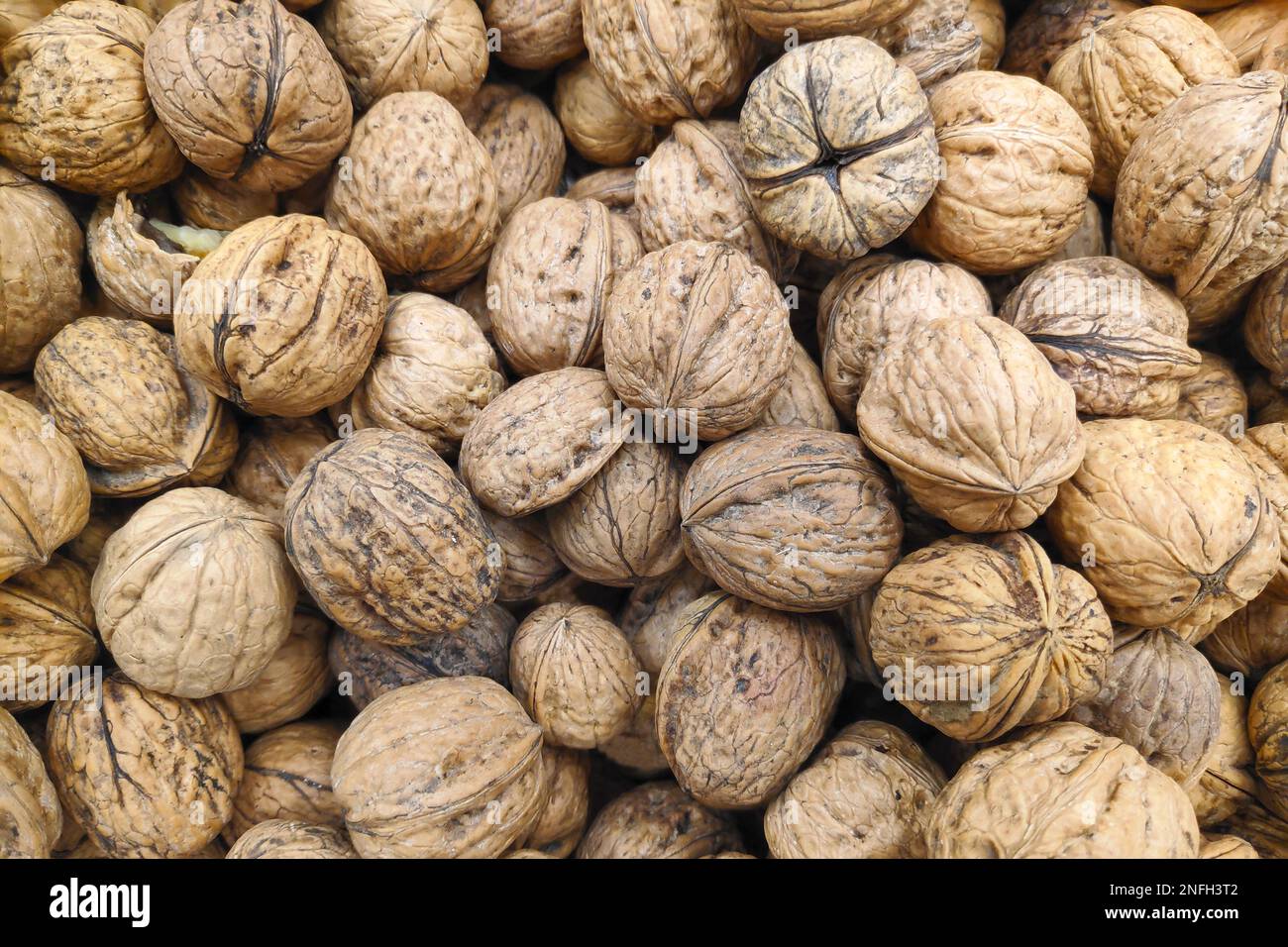 Close-up on a stack of walnuts for sale on a market stall Stock Photo ...