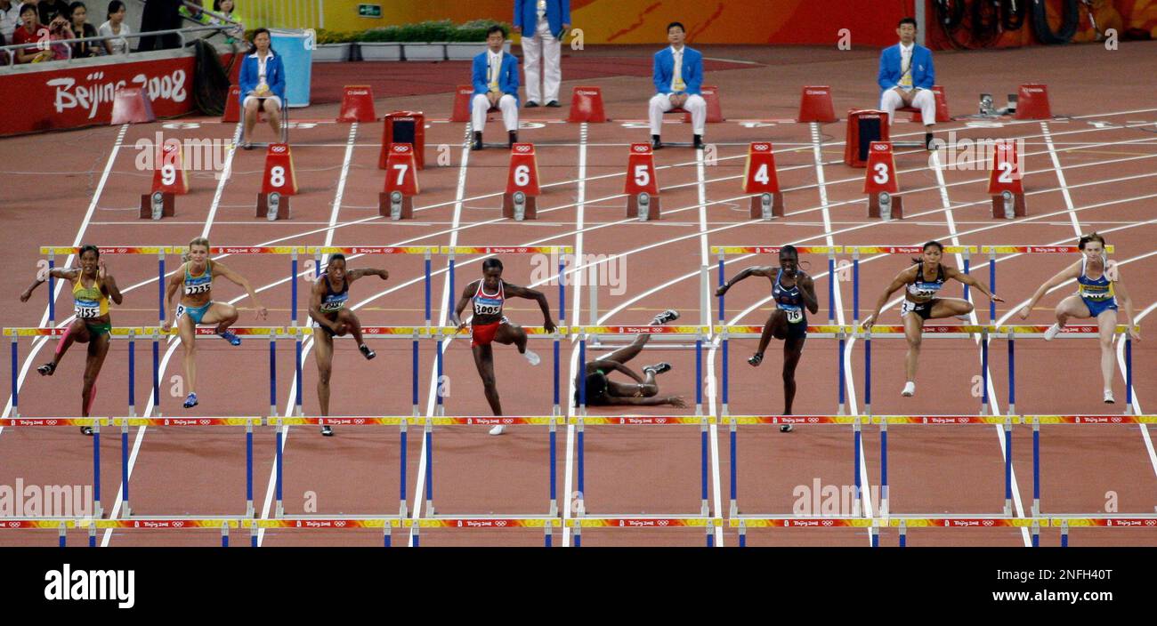 Fatmata Fofanah of Guinea, fourth from right, falls down as other ...