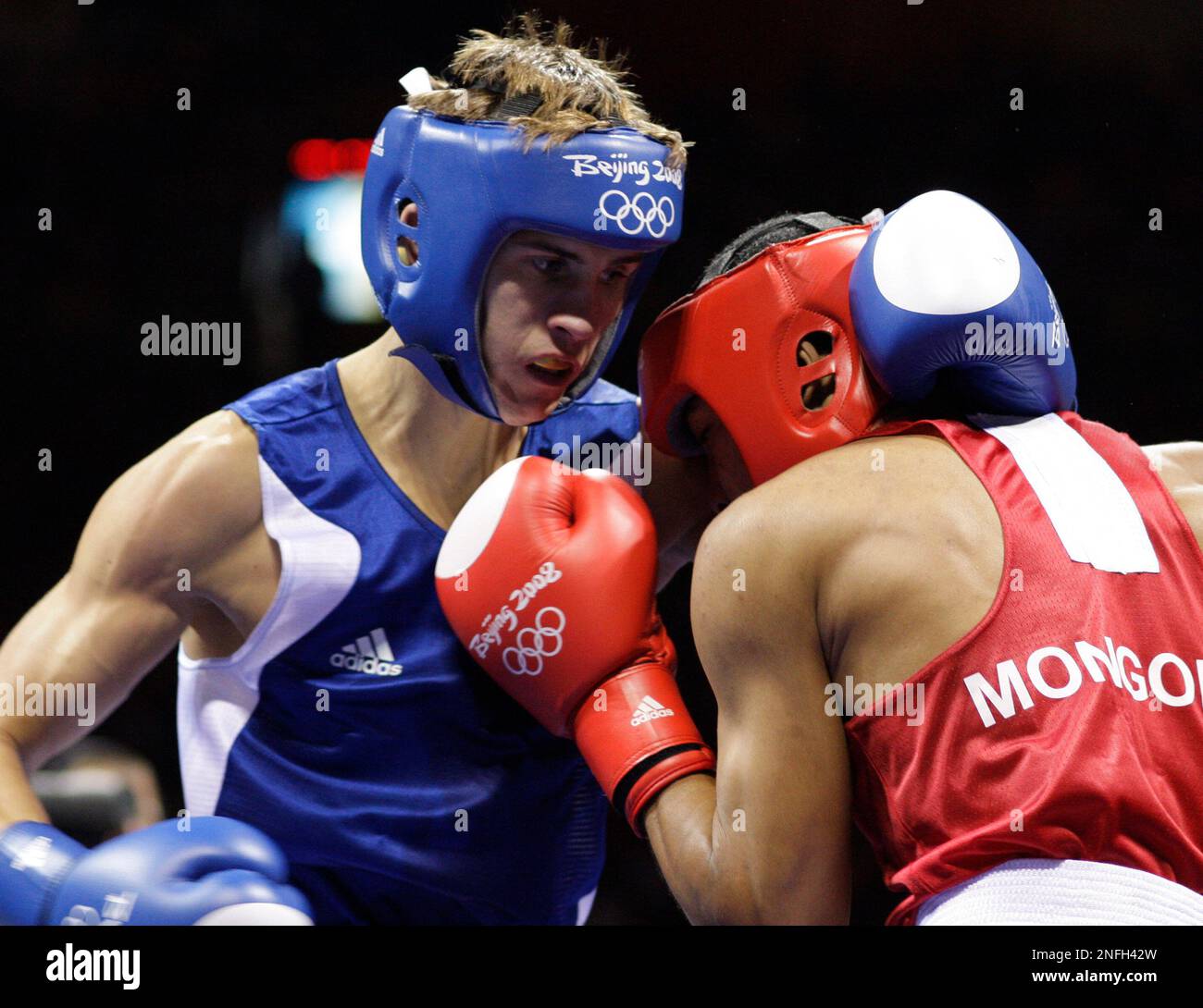 Munkh-Erdene Uranchimeg of Mongolia, right, fights Alexis Vastine of ...