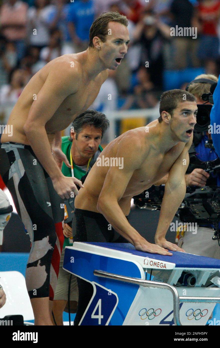 Aaron Peirsol, left, and Michael Phelps of the United States watch ...