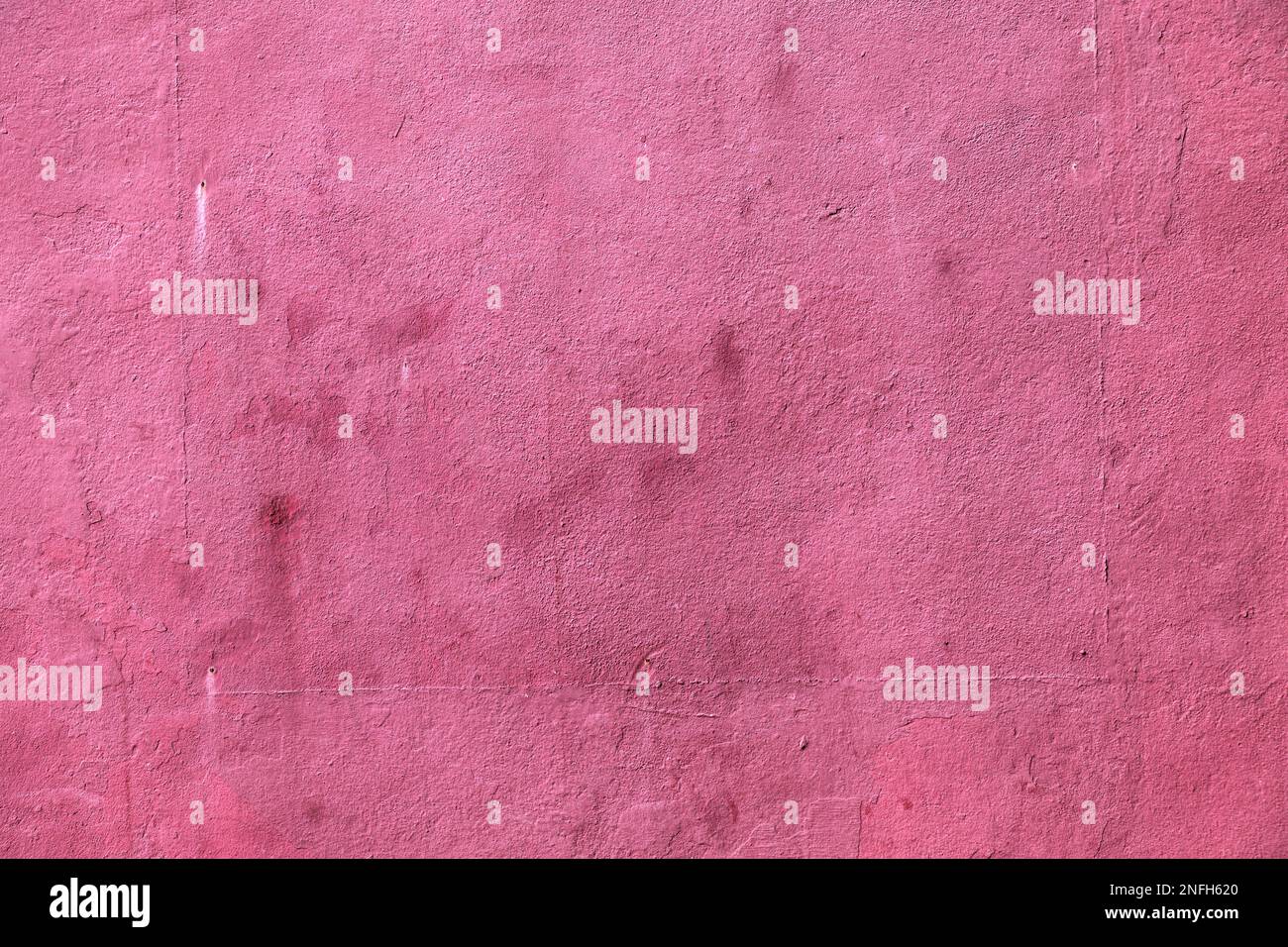 A wall painted in red that can be used as wallpaper or as background ...