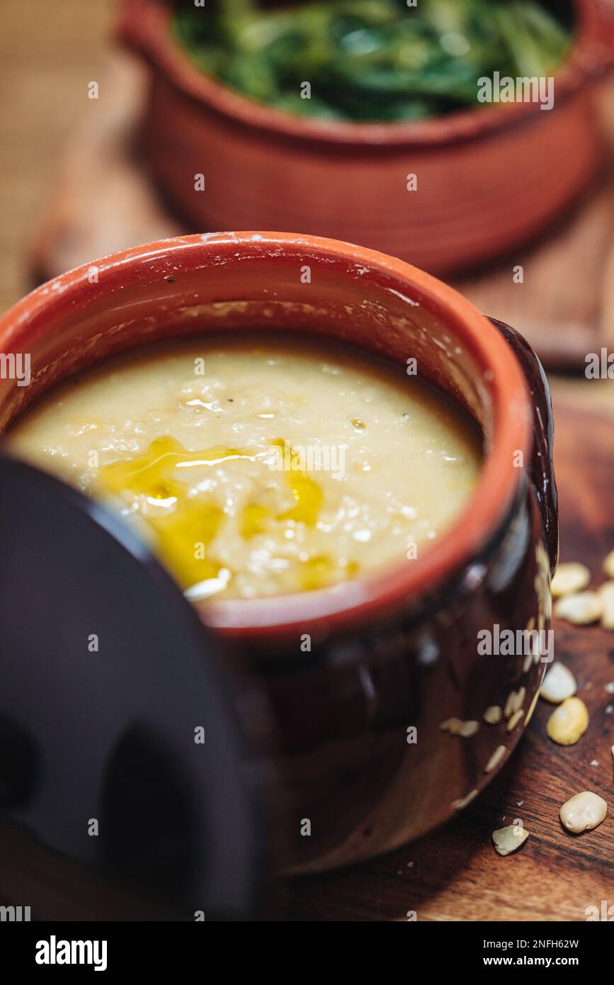 Traditional chicory and fava beans meal from Puglia, Italy Stock Photo ...