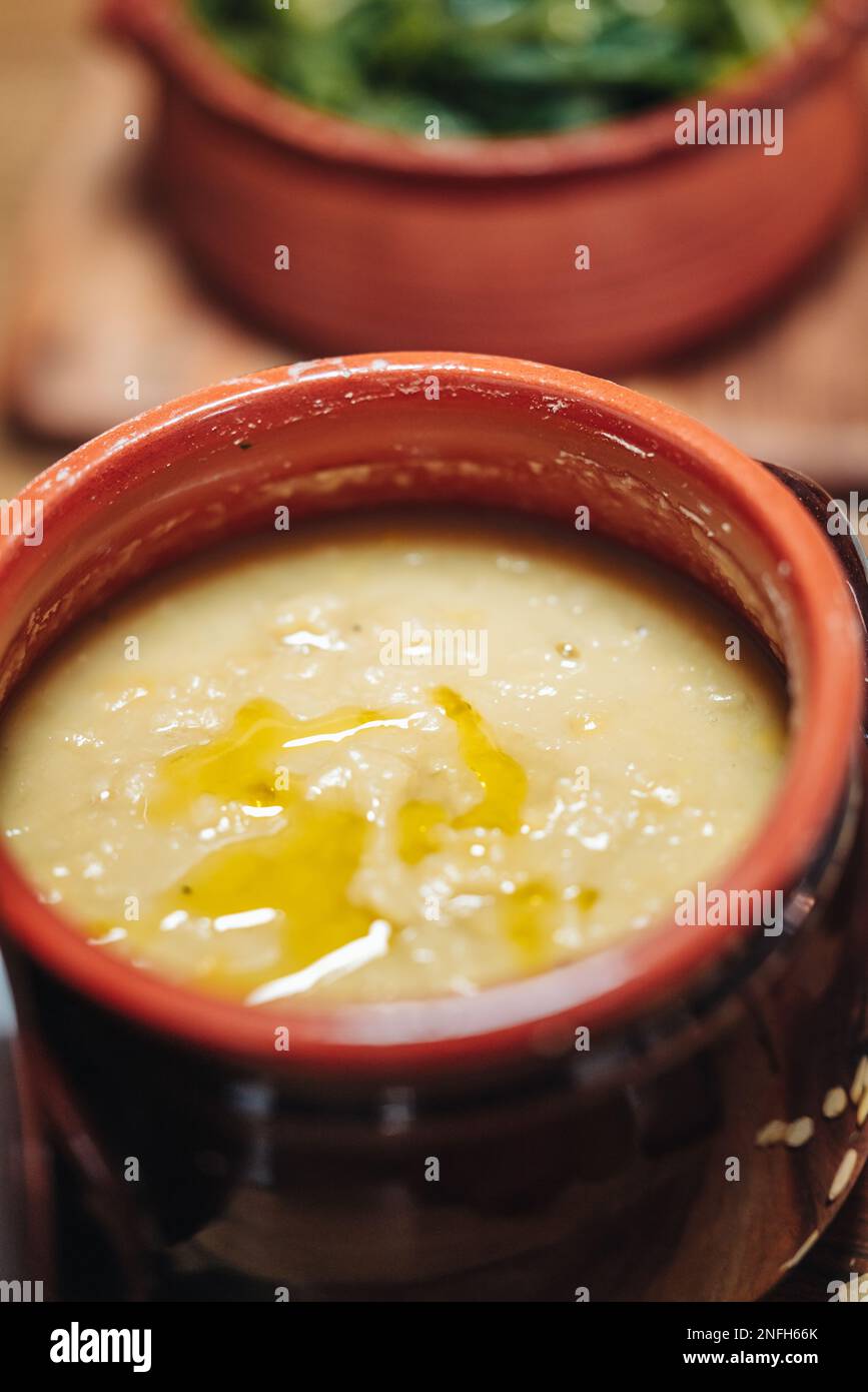 Traditional chicory and fava beans meal from Puglia, Italy Stock Photo ...