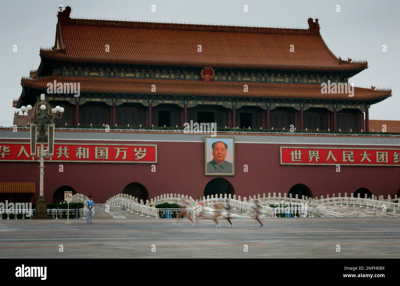 Olympic women athletes taking part in the Women's Marathon run past the ...