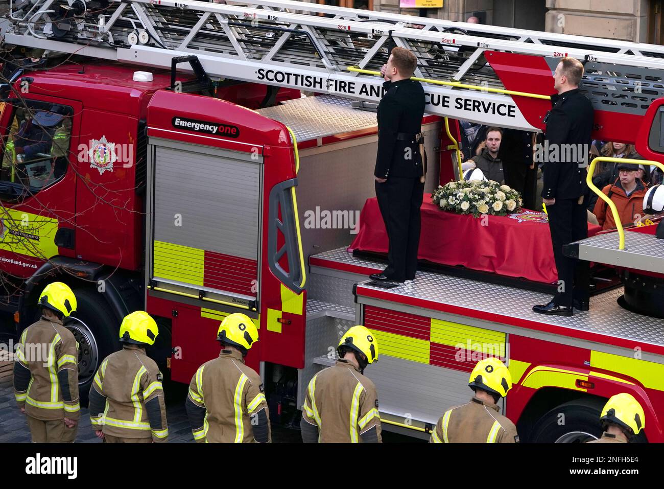 The coffin of Barry Martin arrives on a fire engine outside St Giles ...