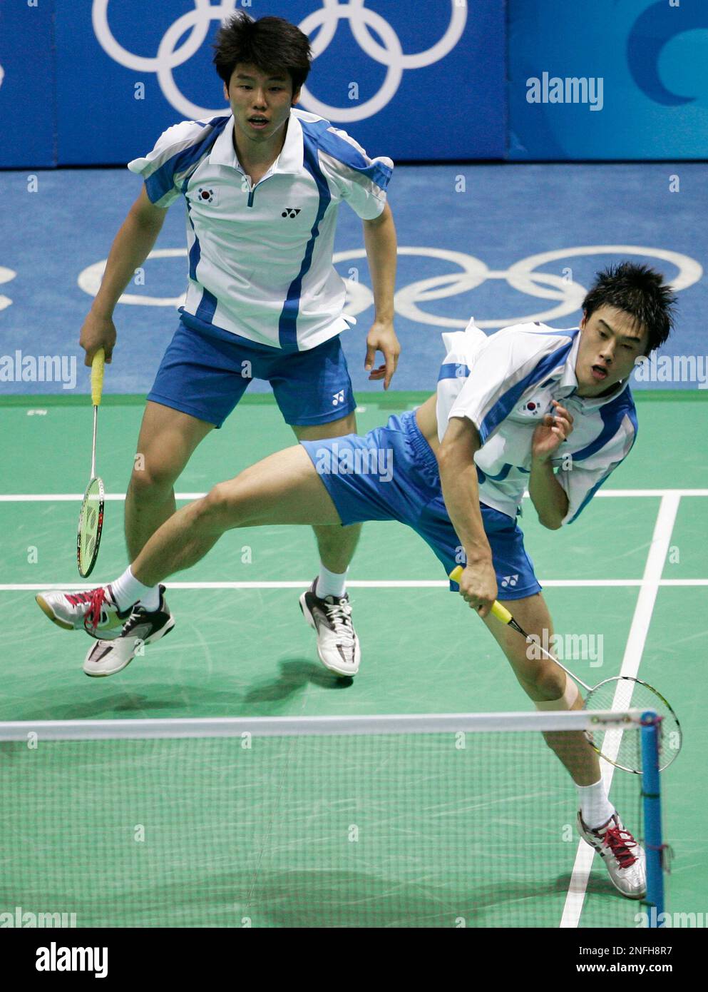 South Korea's Hwang Ji-man, left, and Lee Jae-jin compete to win the ...