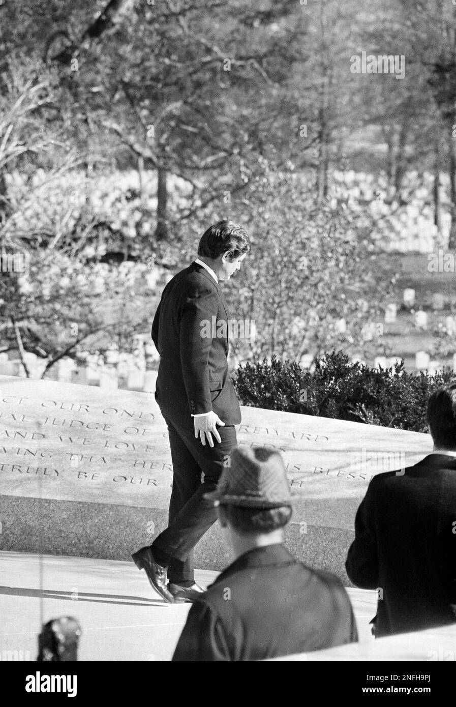 Sen. Edward Kennedy, D-Mass., walks slowly along the wall beside the ...
