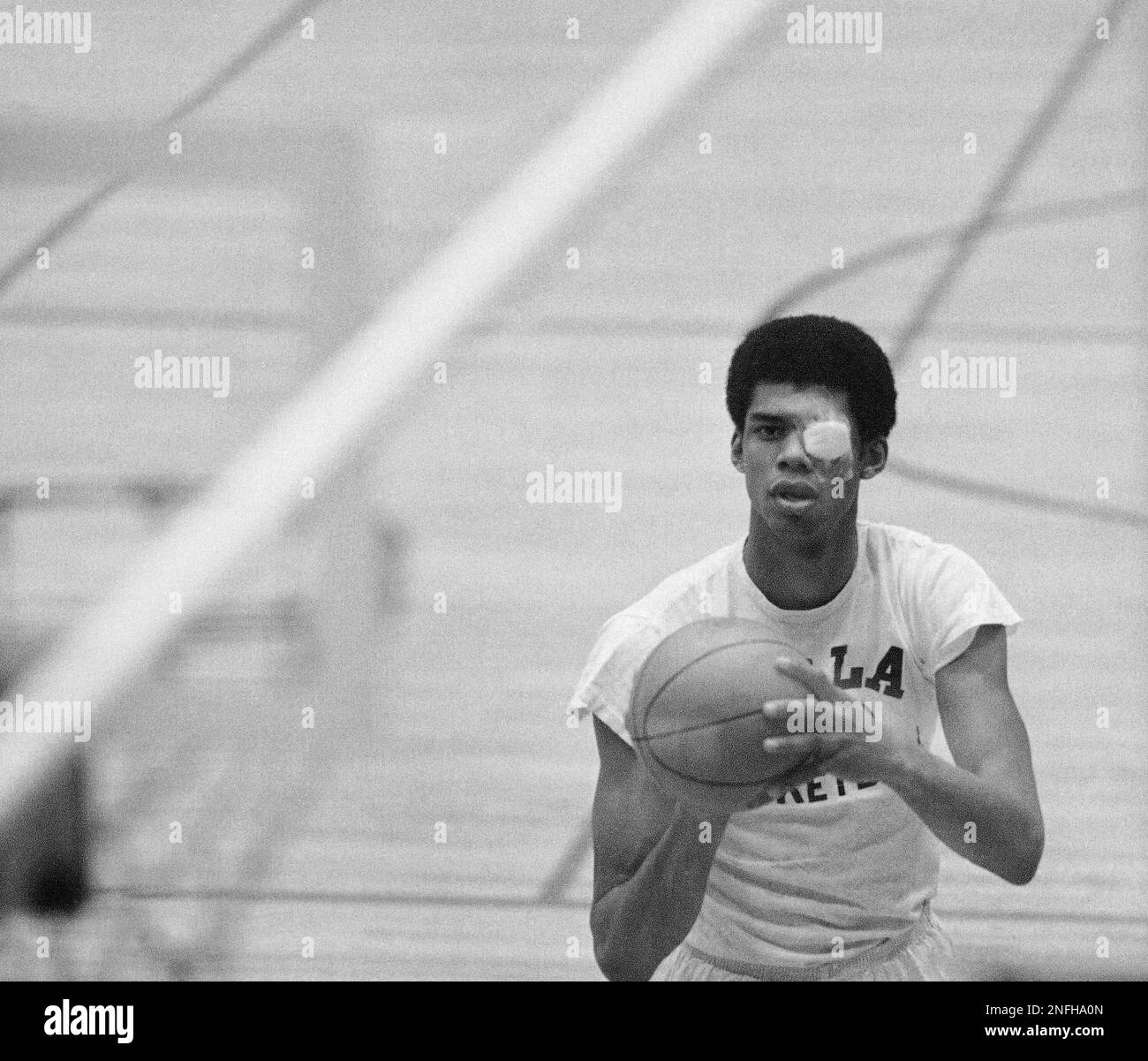 Lew Alcindor, the star of UCLA's No.1-ranked basketball team, pops in a ...