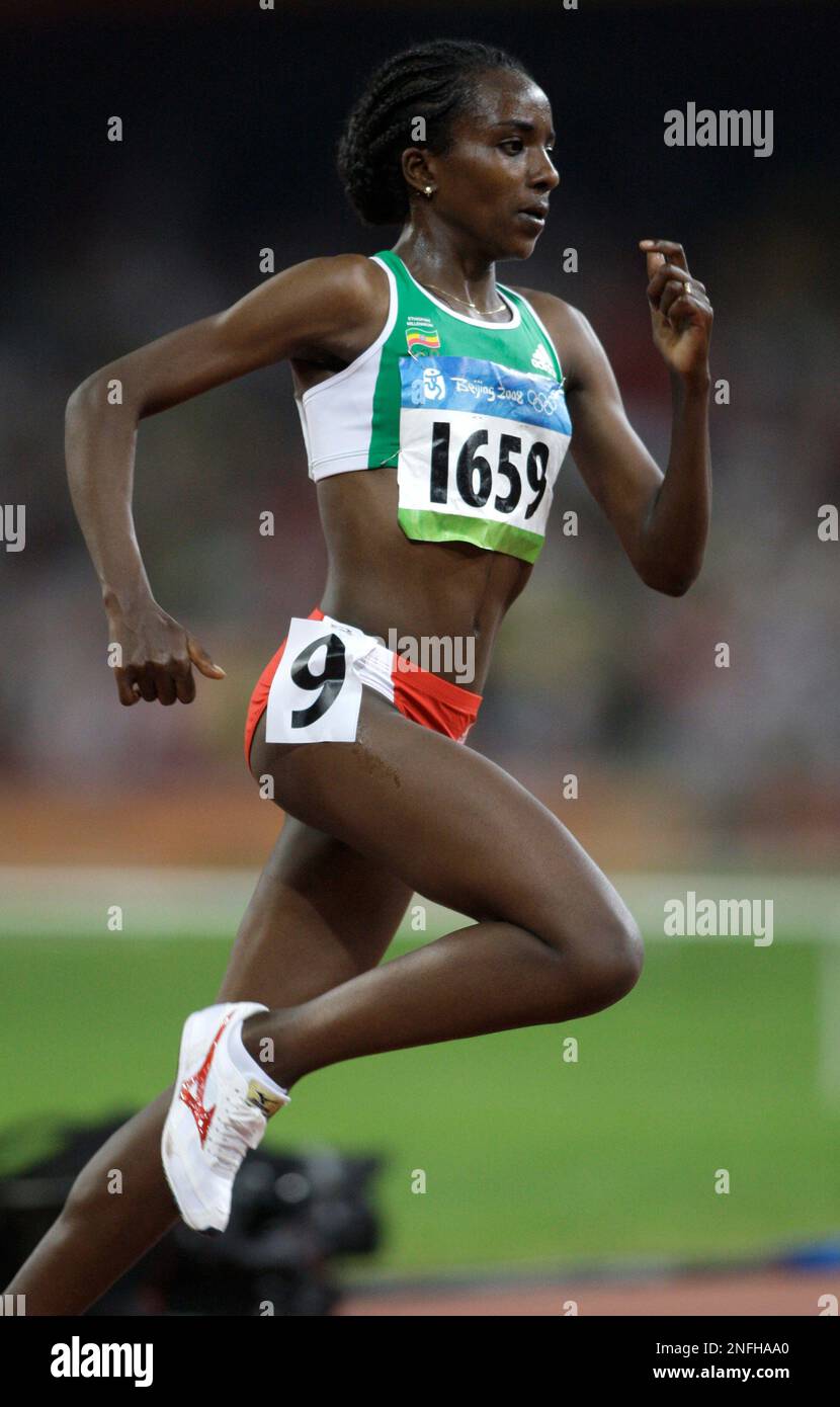 Tirunesh Dibaba of Ethiopia competes for a gold medal in the women's ...