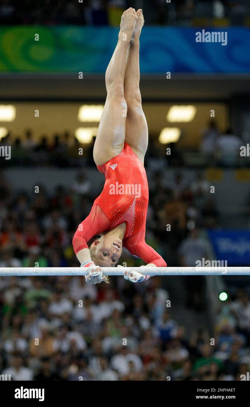 United States gymnast Shawn Johnson performs on the horizontal bar ...