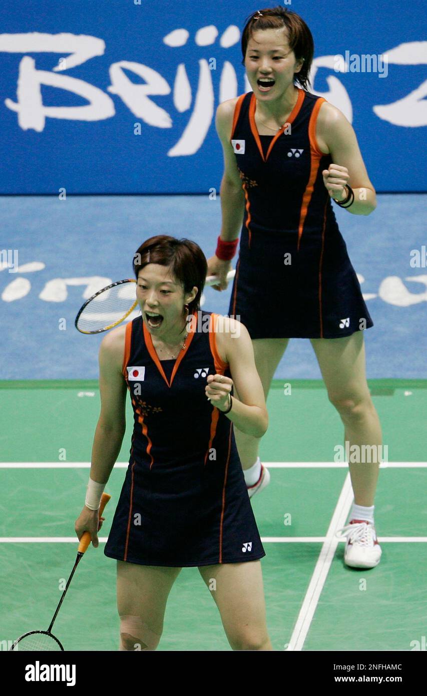 Japanese pair Miyuki Maeda, top, and Satoko Suetsuna celebrate a point ...