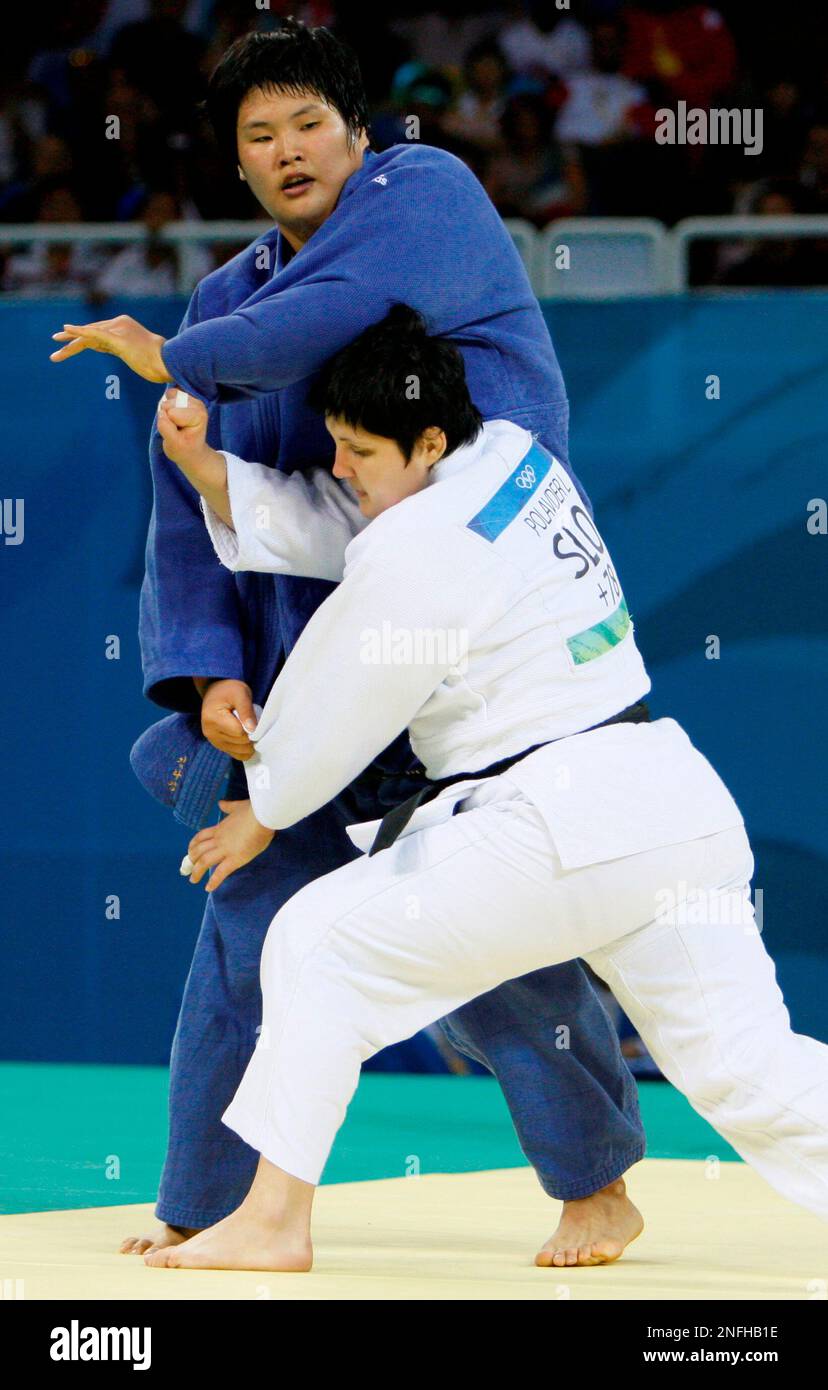 Lucija Polavder of Slovenia, white, fights Kim Nayoung of Korea at the ...
