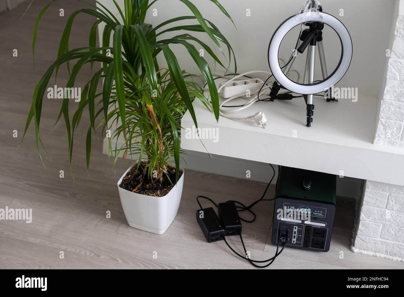 Portable Power Station is charging gadgets. Modern, information ...