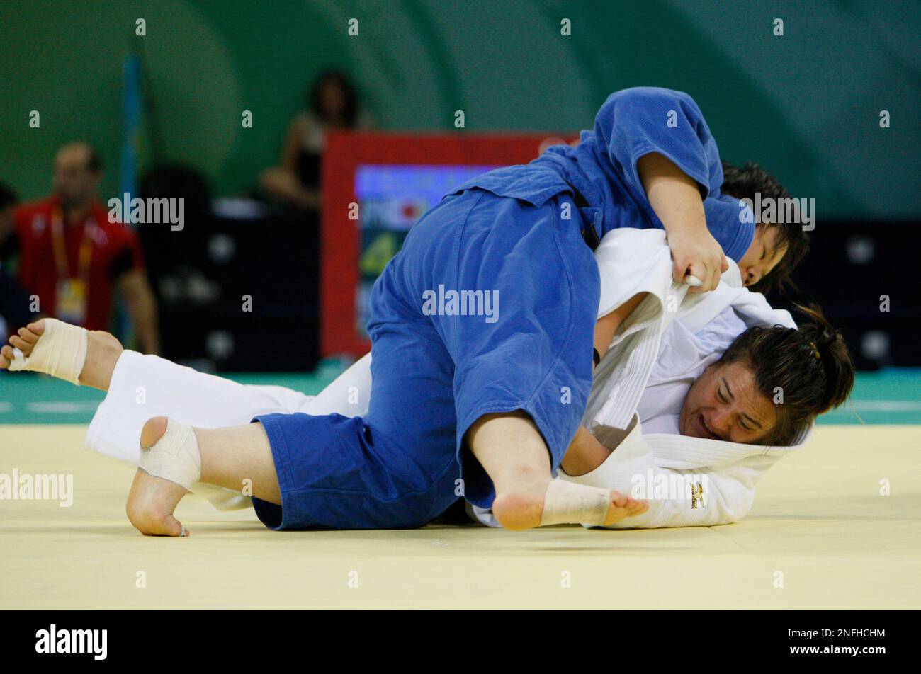 Mexico's Vanessa Zambotti, white, fights Japan's Maki Tsukada as they ...