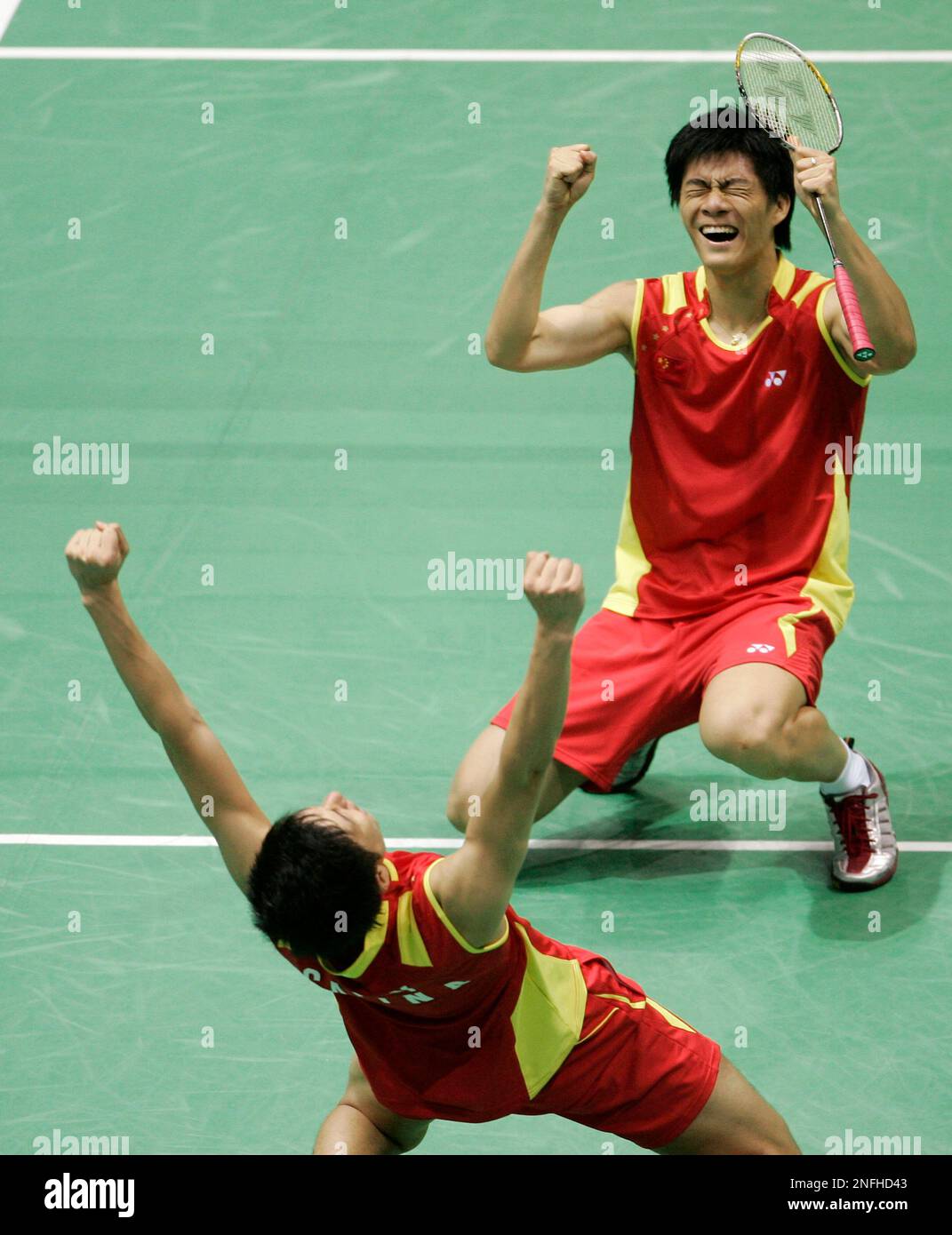 China's Cai Yun, bottom, and Fu Haifeng celebrate their win against ...