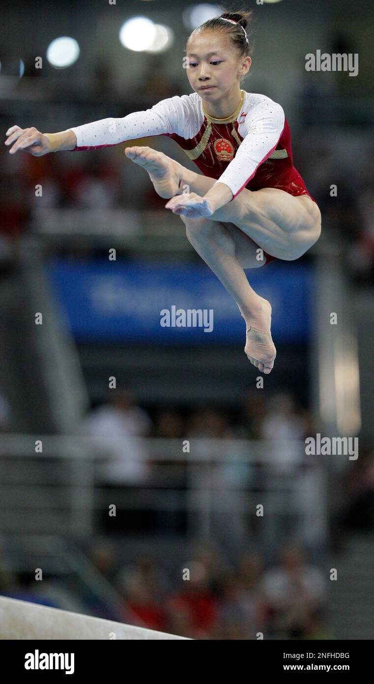 China's gymnast Yang Yilin performs on the balance beam during the ...