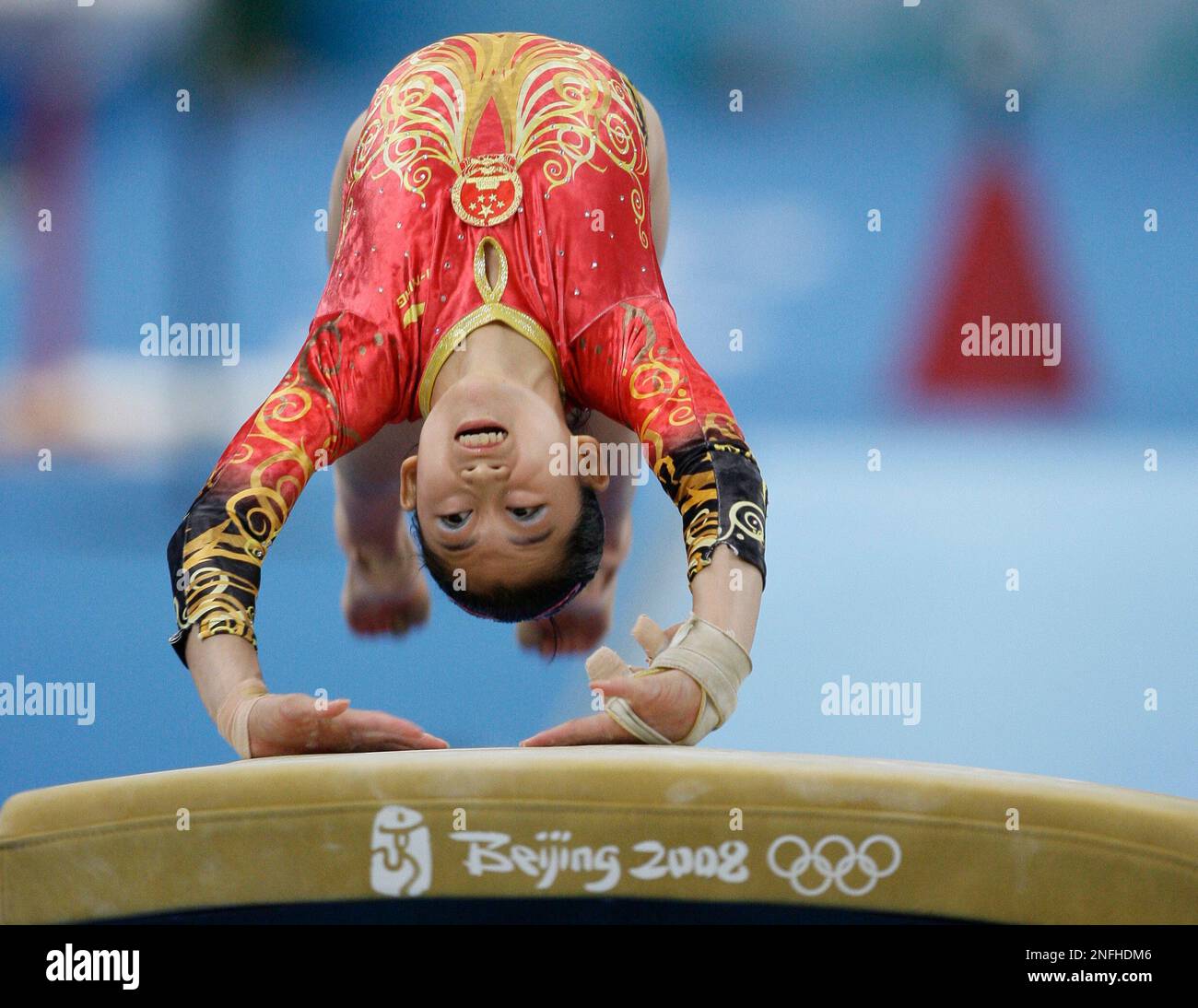 China's gymnast Jiang Yuyuan performs on the vault during the women's ...