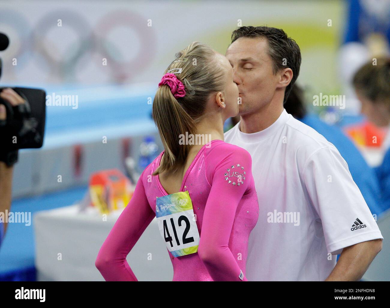 U.S. gymnast nastia Liukin kisses her father, coach Valeri Liukin after ...