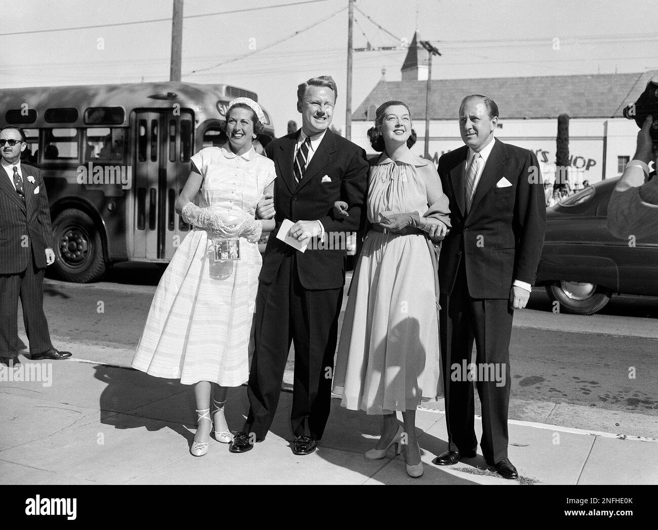 Van Johnson (left) escots his wife Evie and Freddie Brisson arrives ...