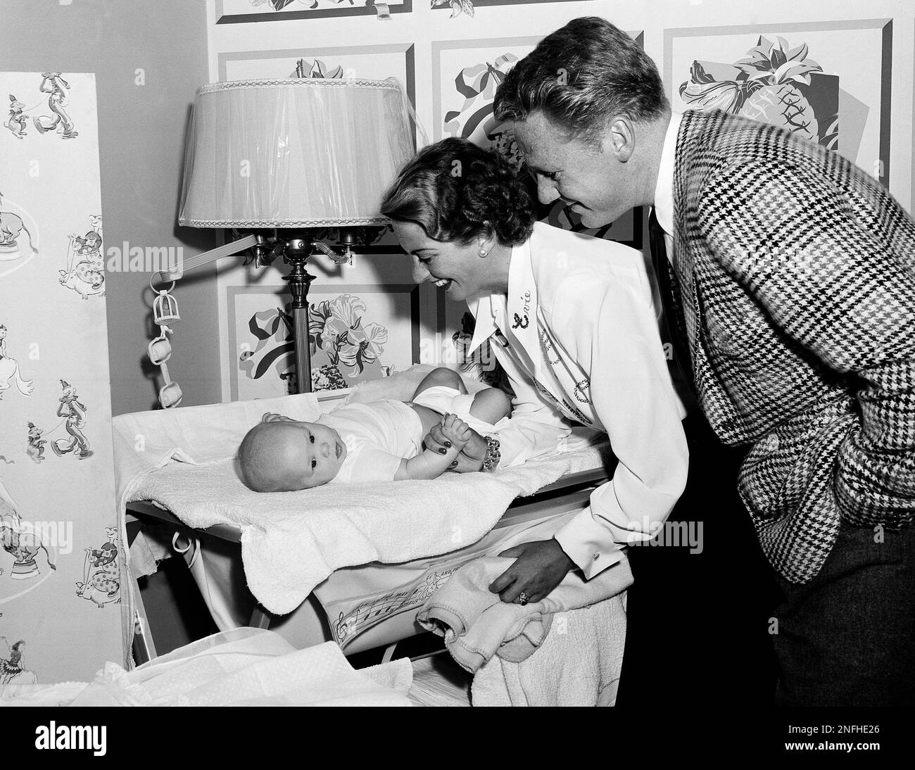 Five-month-old Schuyler Van Johnson is the center of attraction as she ...