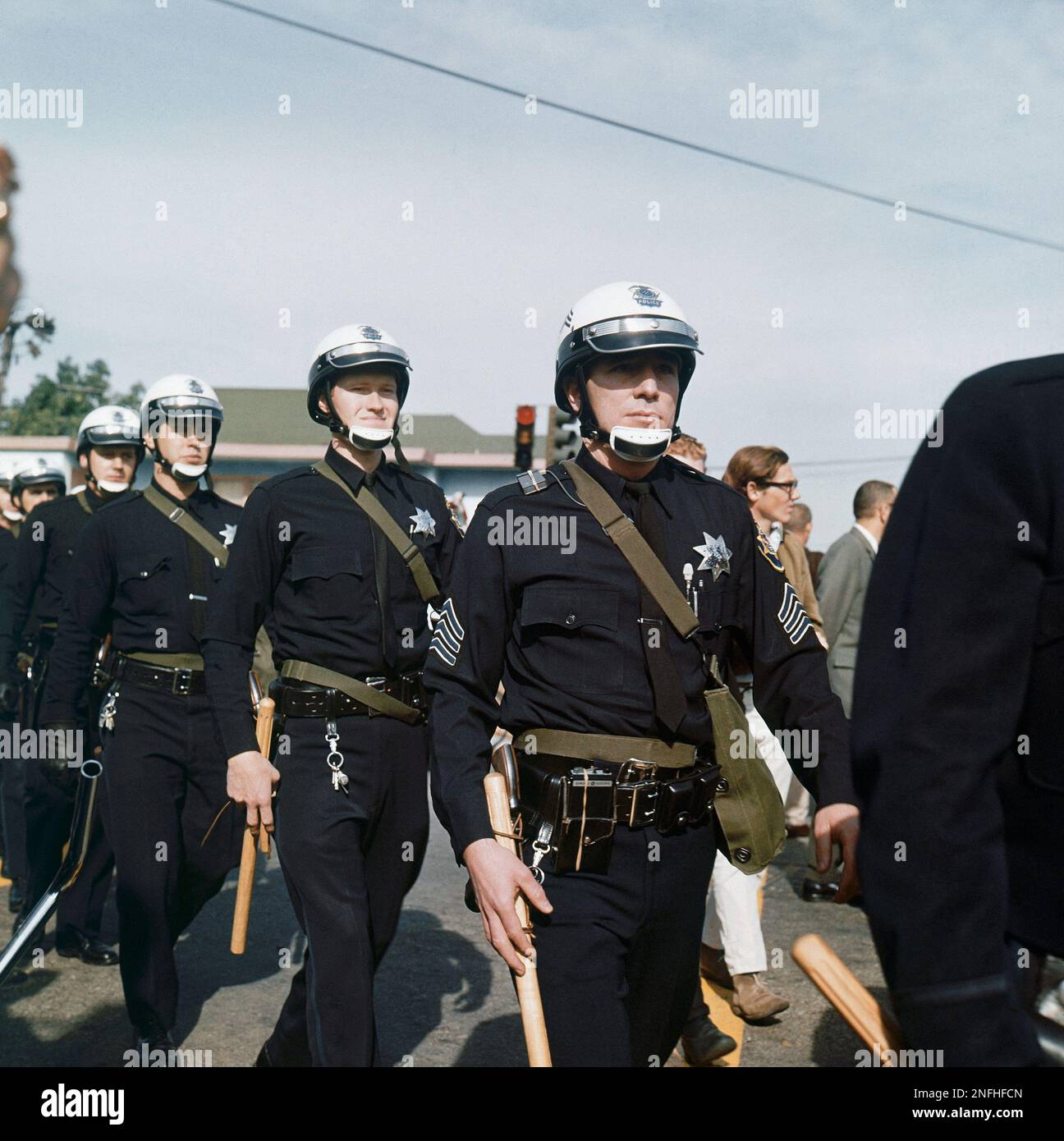 Berkeley police line the streets to keep anti-war protesters and a ...