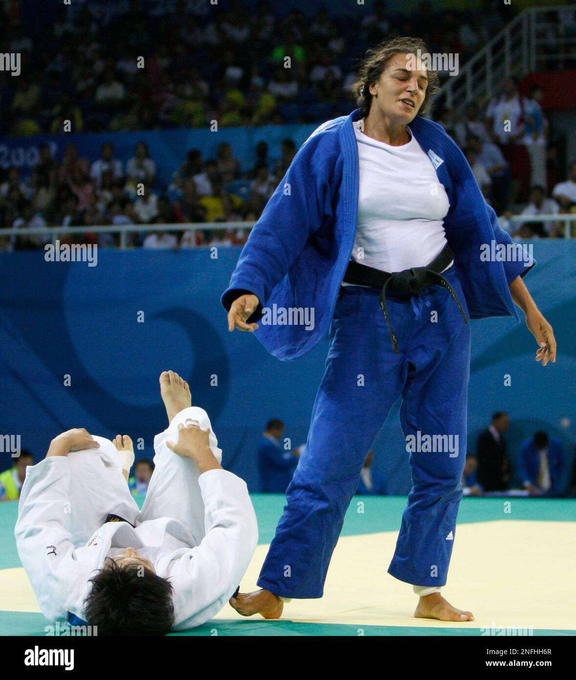 Japan's Sae Nakazawa, white, and Italy's Lucia Morico compete at the ...