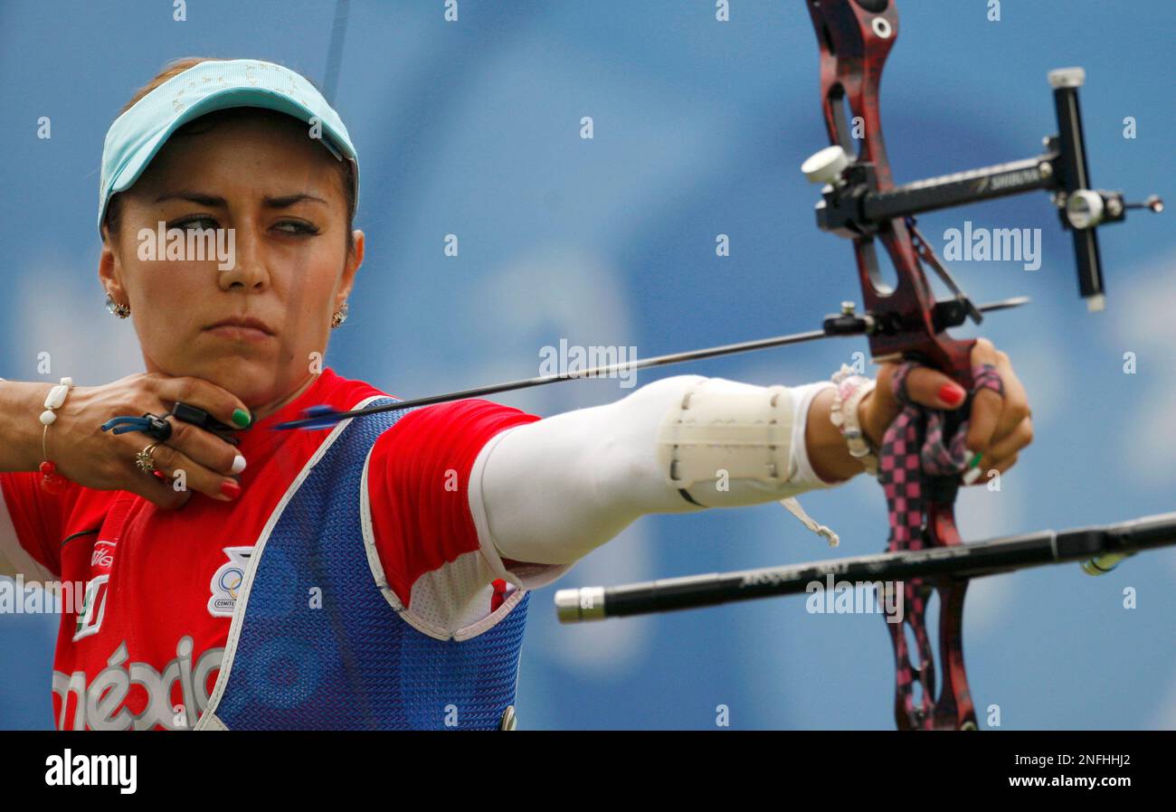 Aida Roman, of Mexico, shoots an arrow during the women's individual ...