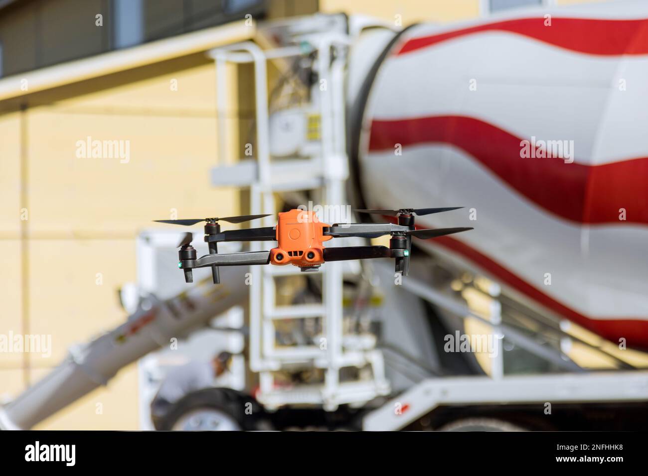Help of the drone is used by an inspector on construction site to ...