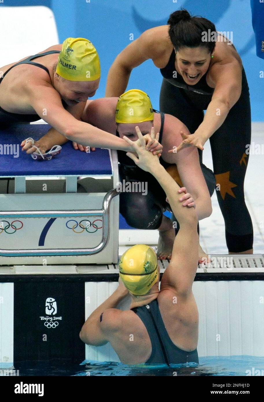 Australia's Kylie Palmer, Bronte Barratt and Stephanie Rice, top from left, celebrate with final ...