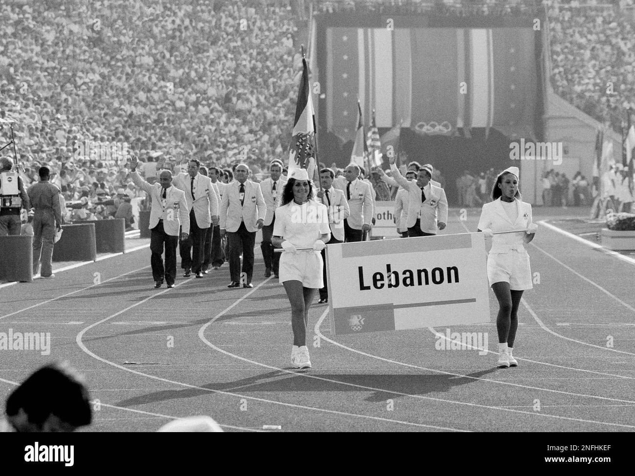 Members of the Lebanon Olympic team march in the Parade of the Athletes ...