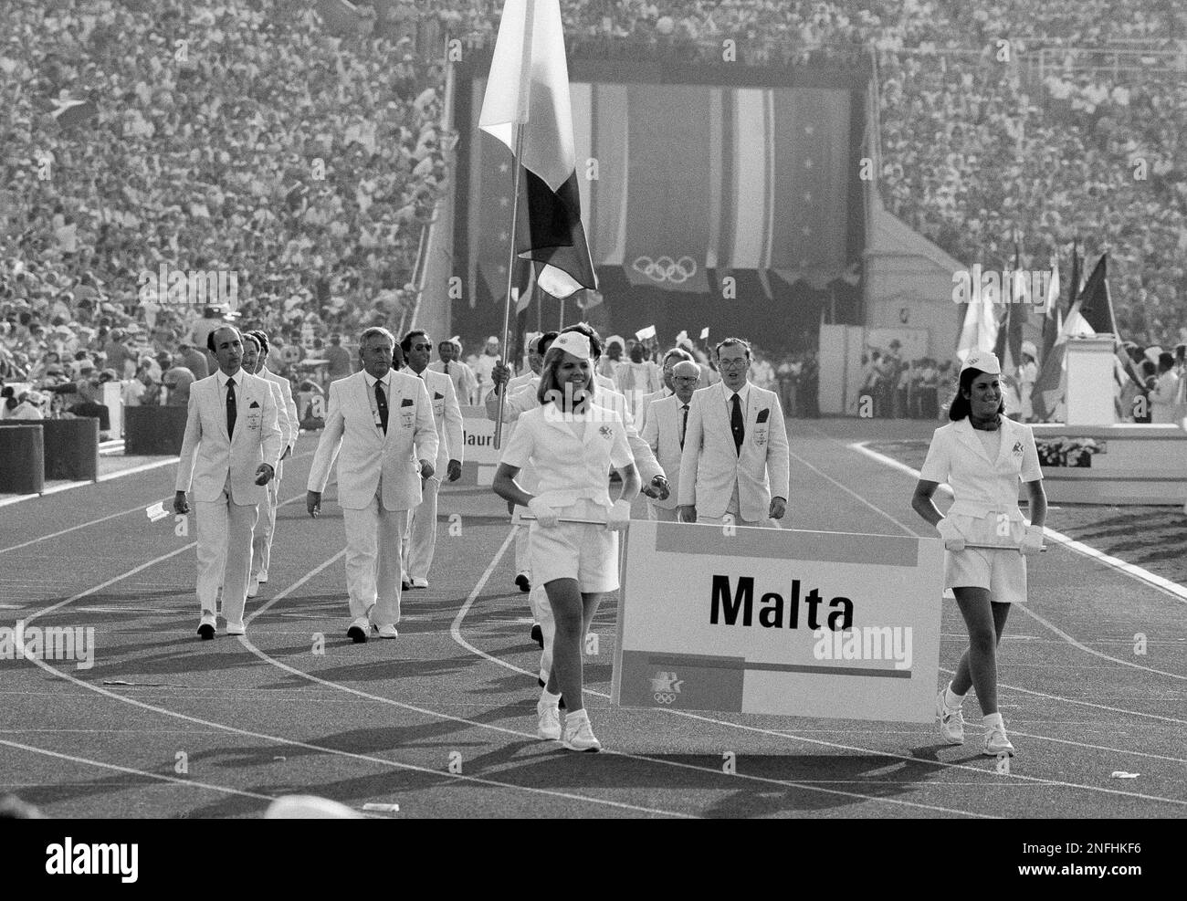 Members of the Malta Olympic team march in the Parade of the Athletes ...