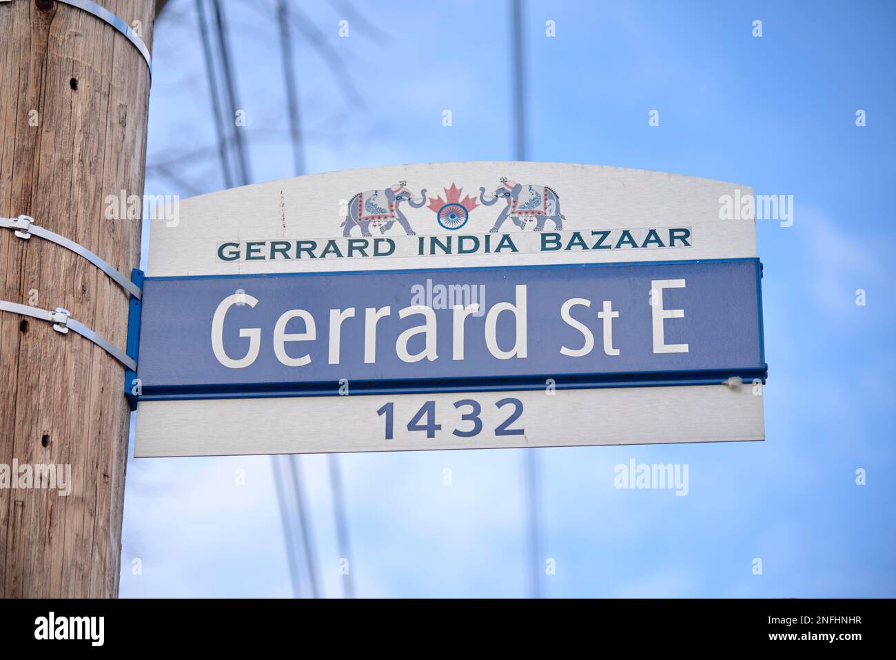 Gerrard Street East street name sign Stock Photo - Alamy