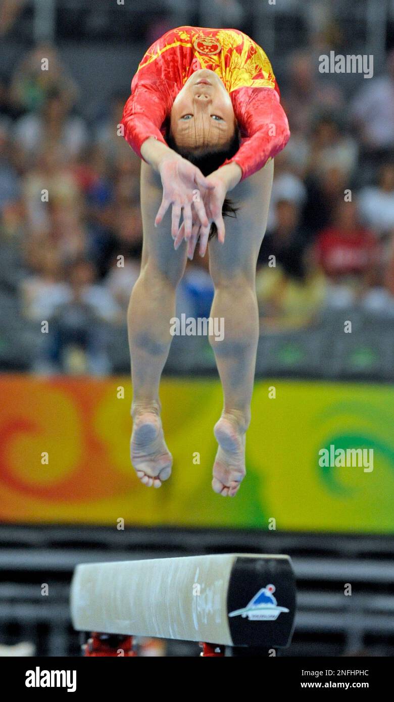 Chinese gymnast Cheng Fei performs on the balance beam during the ...