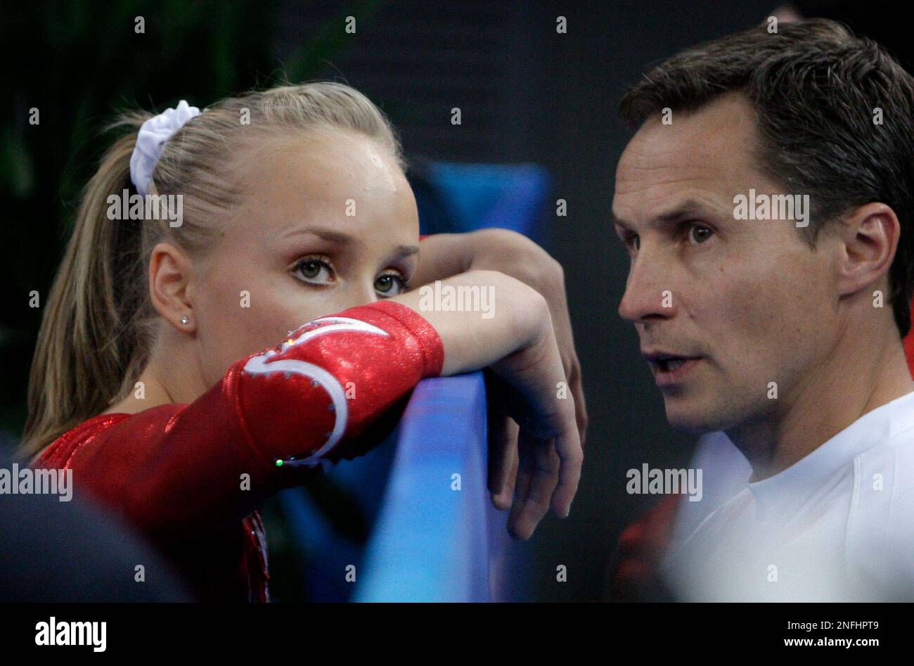 U.S. gymnast Nastia Liukin, speaks with her father and coach Valeri ...