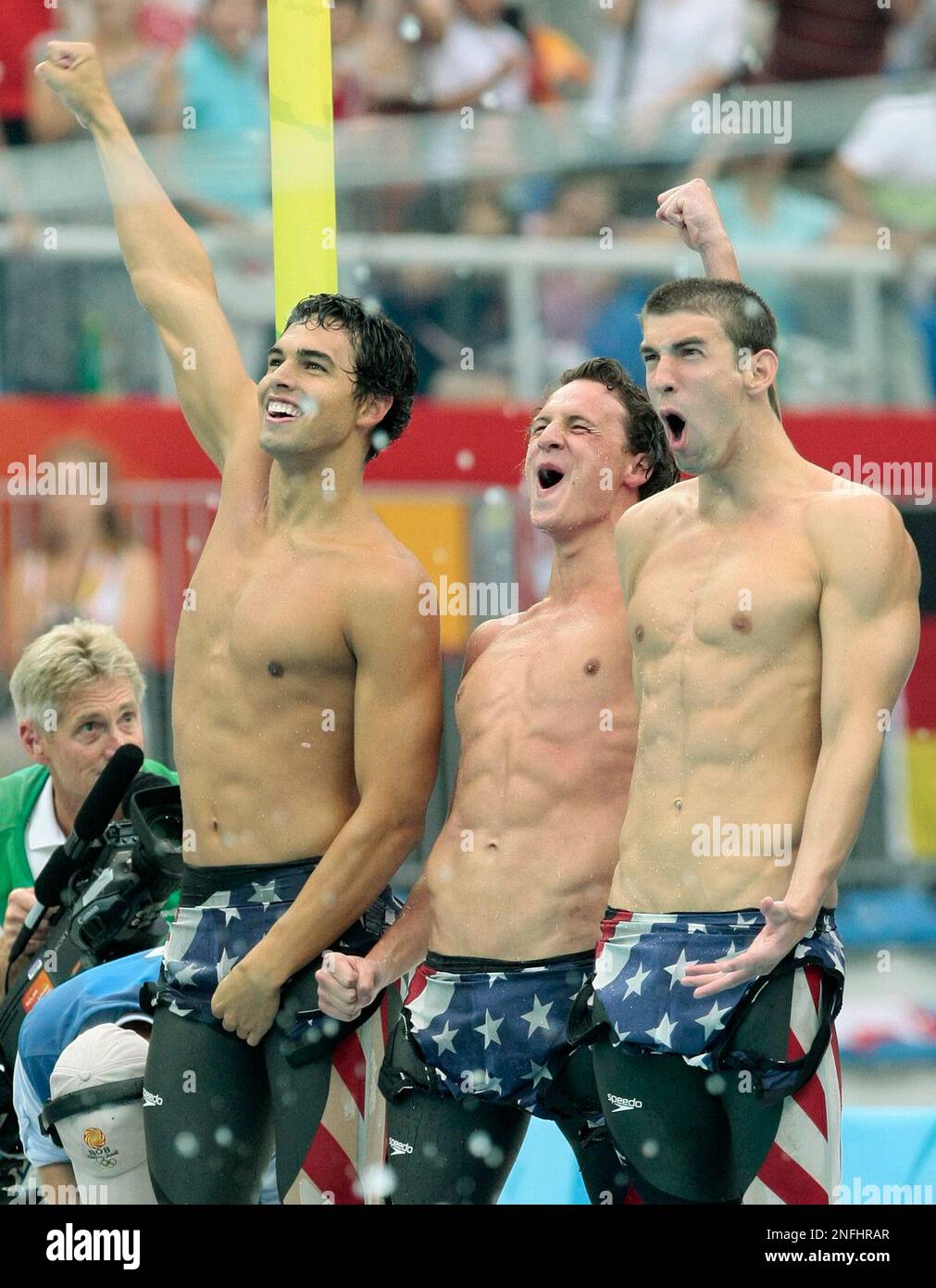 U.S. swimmers, from left, Ricky Berens, Ryan Lochte and Michael Phelps ...