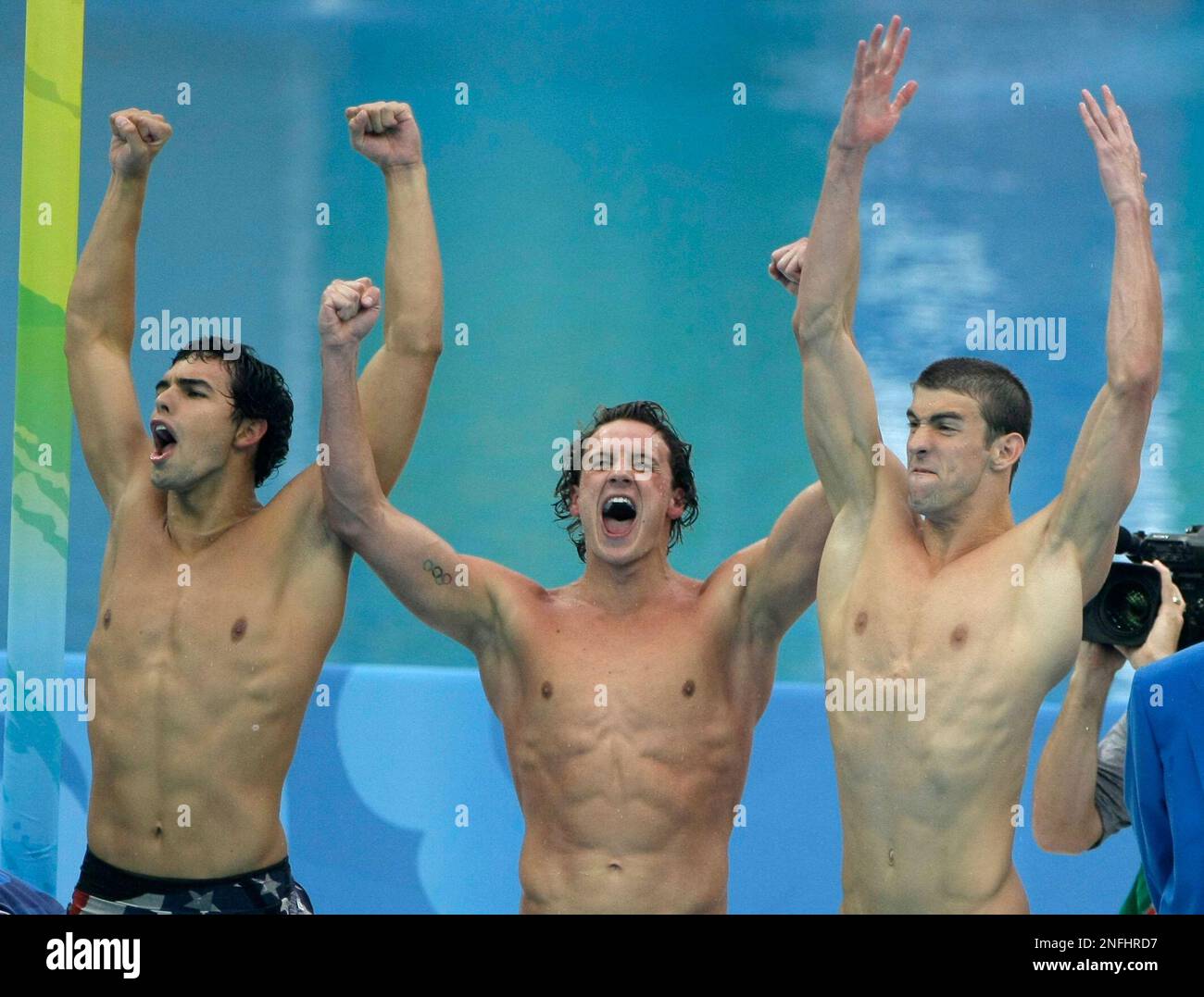 U.S. swimmers, from left, Ricky Berens, Ryan Lochte and Michael Phelps ...