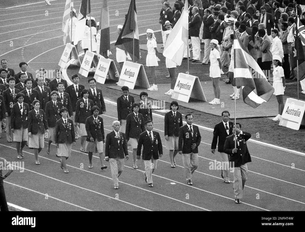 The Olympic team from Thailand marches into the Los Angeles Memorial ...