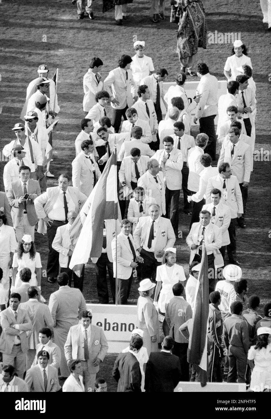 The Lebanese Olympic teams wait in line as other teams march into the ...