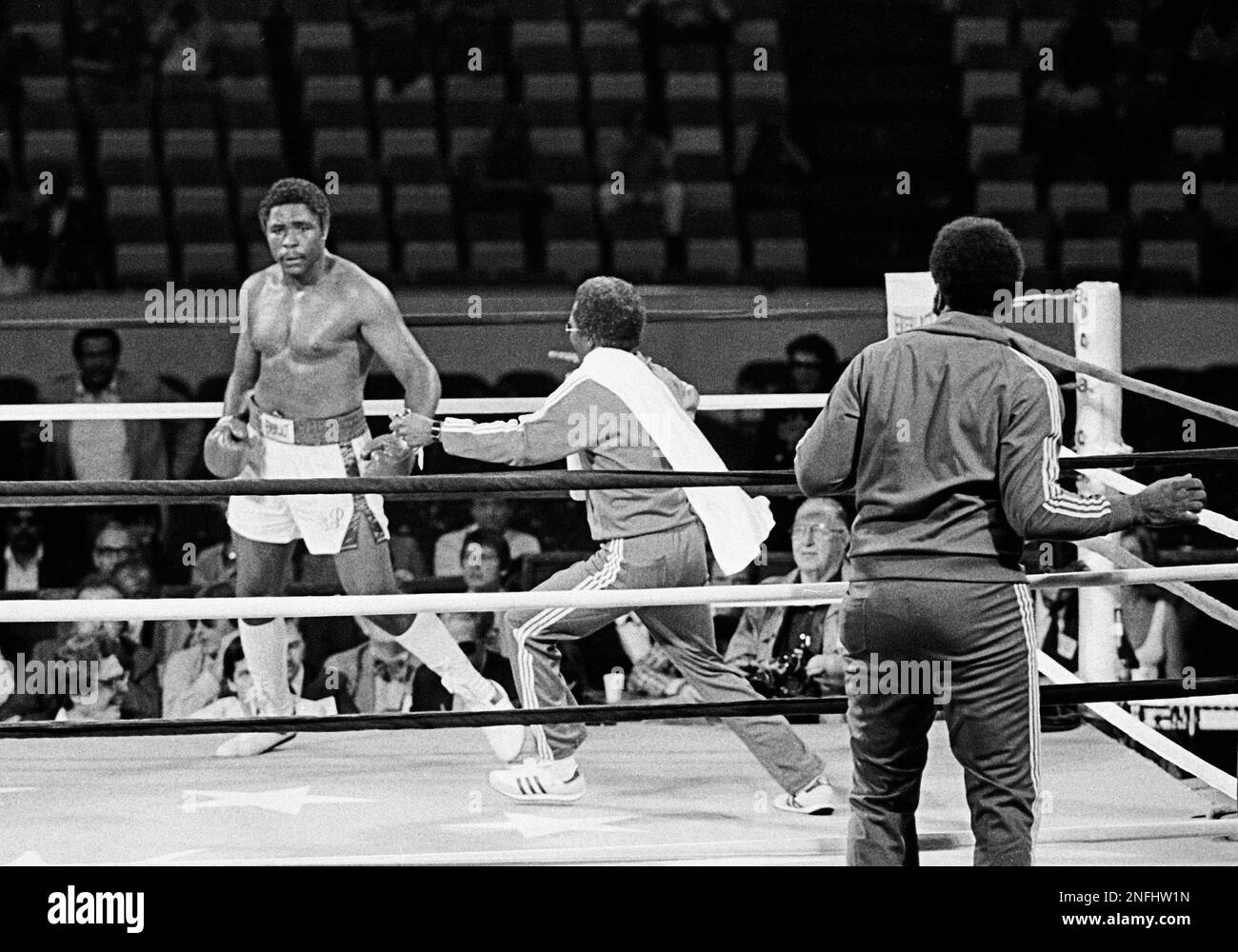 Heavyweight boxer Greg Page is shown, facing camera, as an unidentified ...