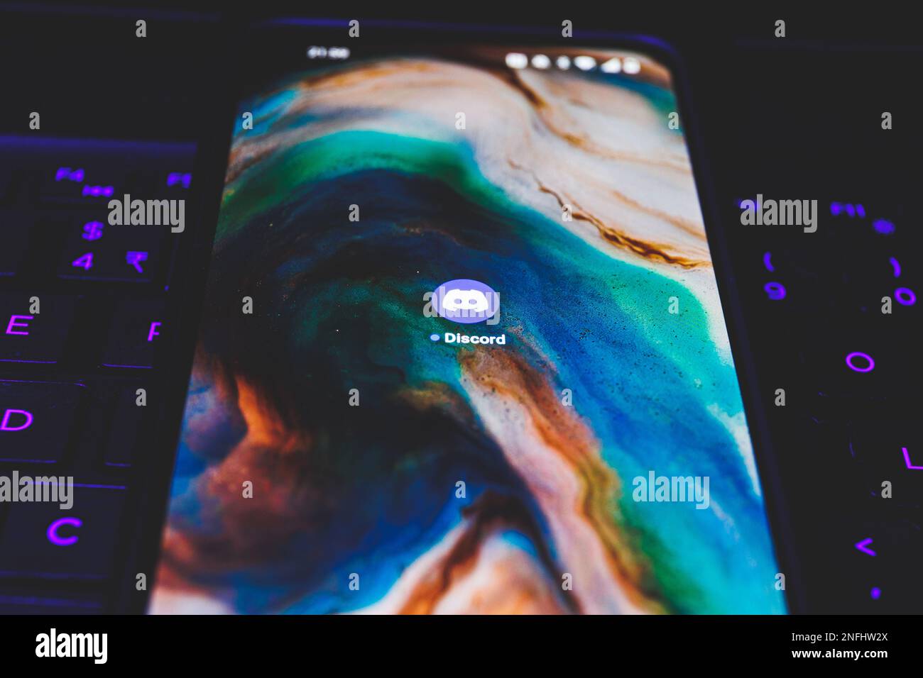 Discord chat app on smartphone screen. Close up shot of Discord chat ...